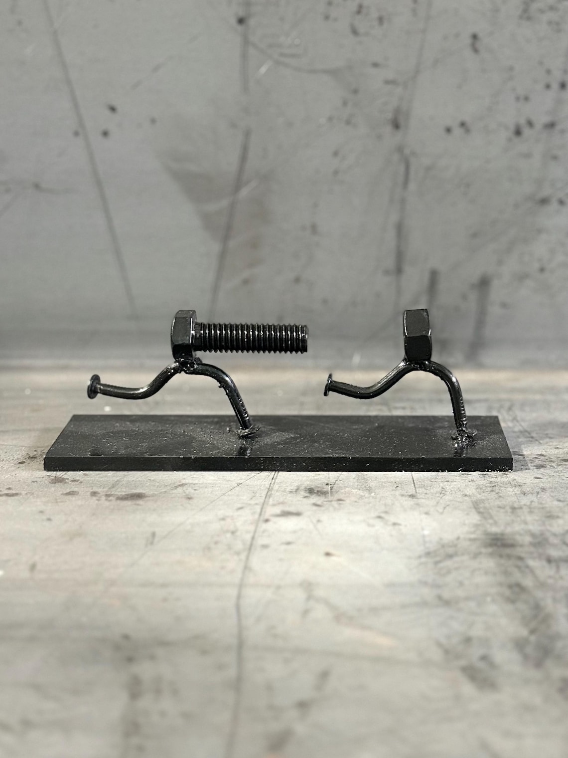 Bolt Chasing Nut Sculpture - Handmade Nuts & Bolts Metal Art - Welded ...