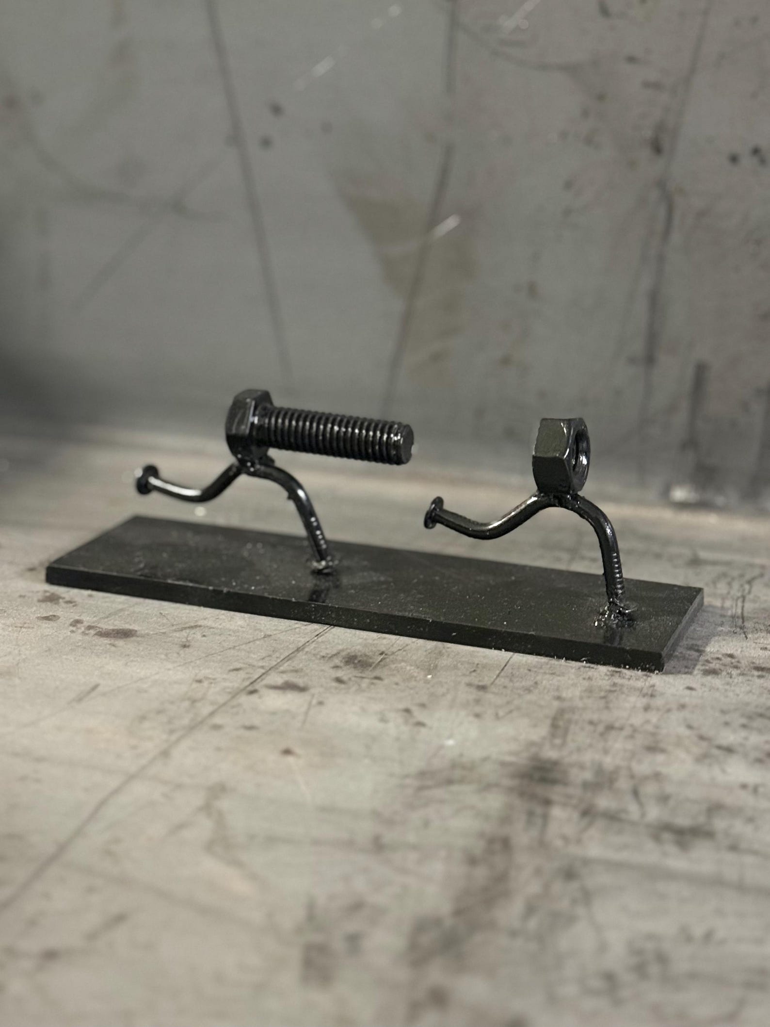 Bolt Chasing Nut Sculpture - Handmade Nuts & Bolts Metal Art - Welded ...