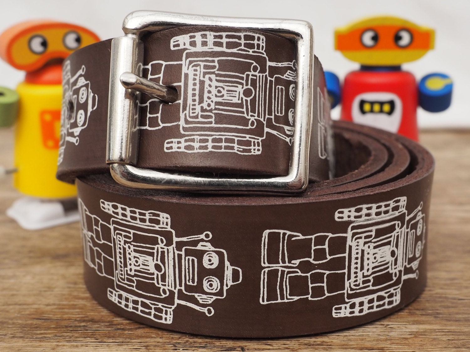 A Toy Robot On A Belt