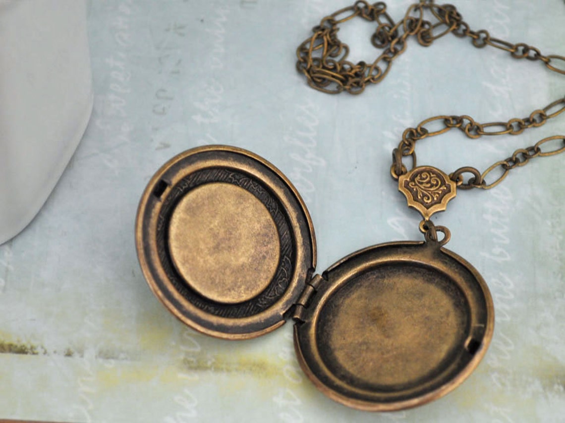 THE ETERNAL KNOT Celtic Knot Locket Necklace in Antiqued Brass - Etsy