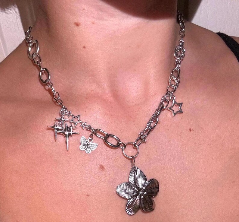 Handmade Silver Charm Statement Necklace With Floral Pendant – Star ...