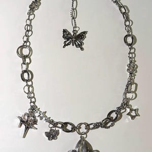 Handmade Silver Charm Statement Necklace With Floral Pendant – Star ...