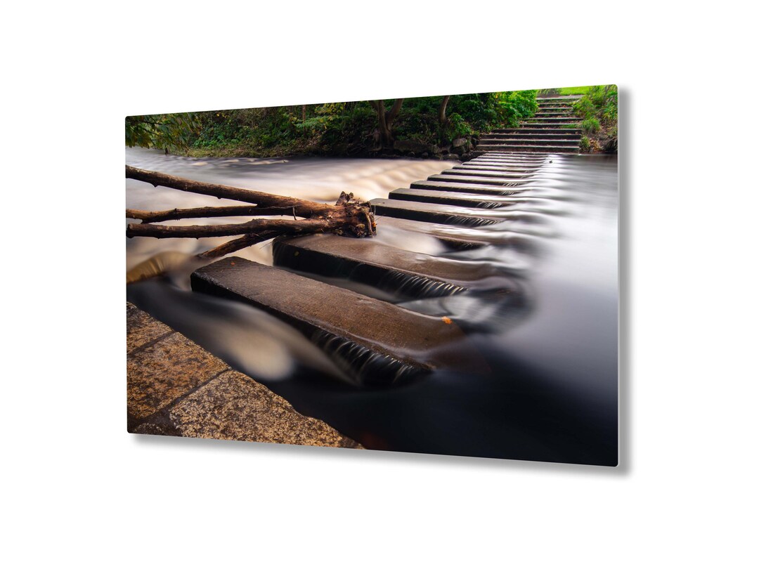 Water Flowing Over the Stepping Stones Across a Stream. Rushing Water ...