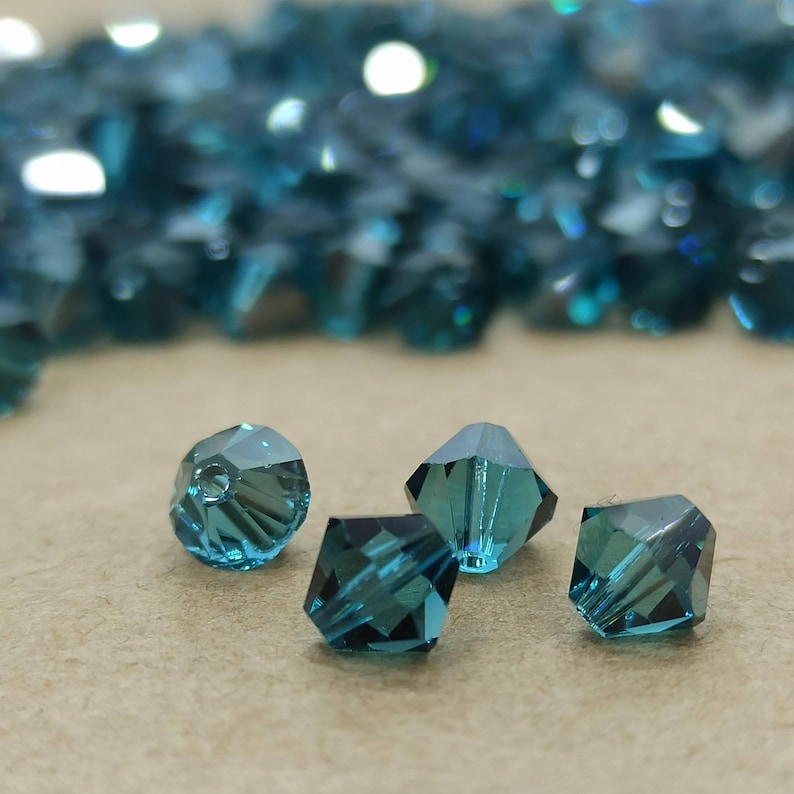 Swarovski İndicolite Satin Crystal Beads: Teal Blue Bicone, Round 6mm ...