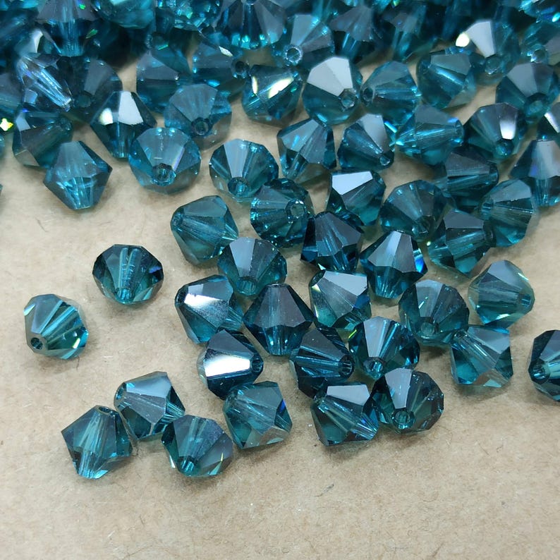 Swarovski İndicolite Satin Crystal Beads: Teal Blue Bicone, Round 6mm ...