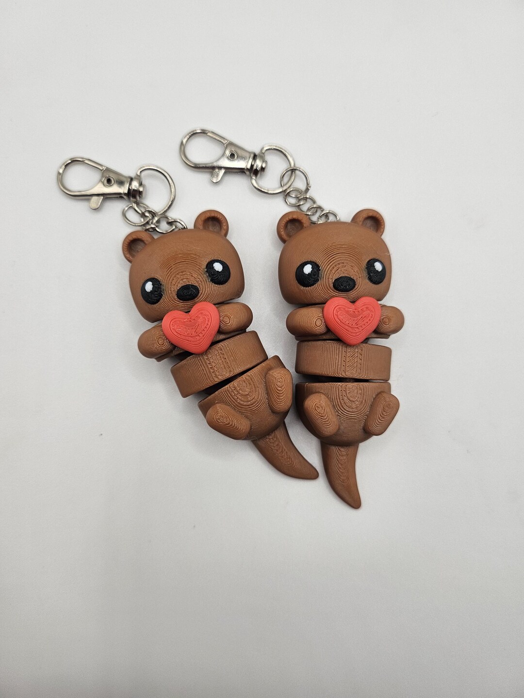 Adorable Otter Holding Heart Keychain – Cute and Unique Accessory ...
