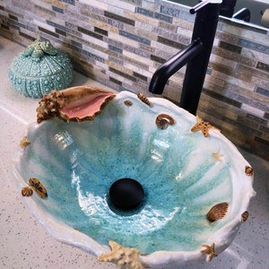Custom Oval Vessel Sink With Large Conch Shell and Smaller Sea Life ...