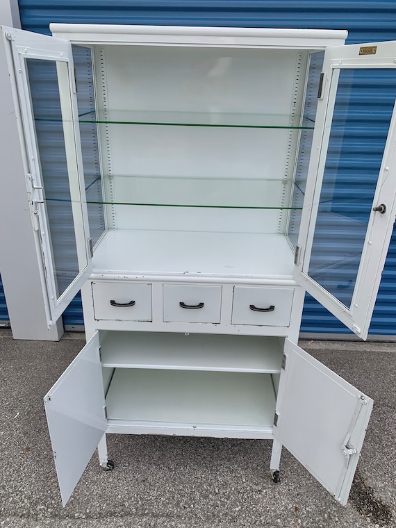 White metal cupboard store