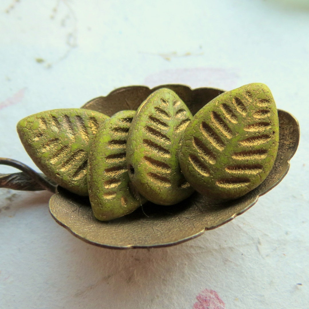GOLDEN AVOCADO LEAVES . 6 Czech Metallic Glass Beads . 12 by 16 Mm ...