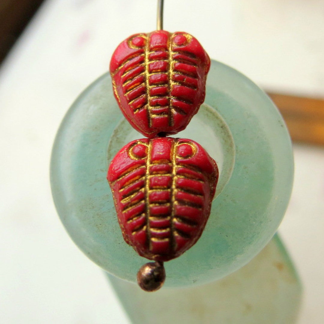 GOLDEN CORAL TRILOBITES . 12 Czech Metallic Glass Beads . 13 Mm by 11 ...