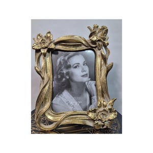 Antique Gold Photo Frame With Flowers. Photo Frame - Unique Decoration ...