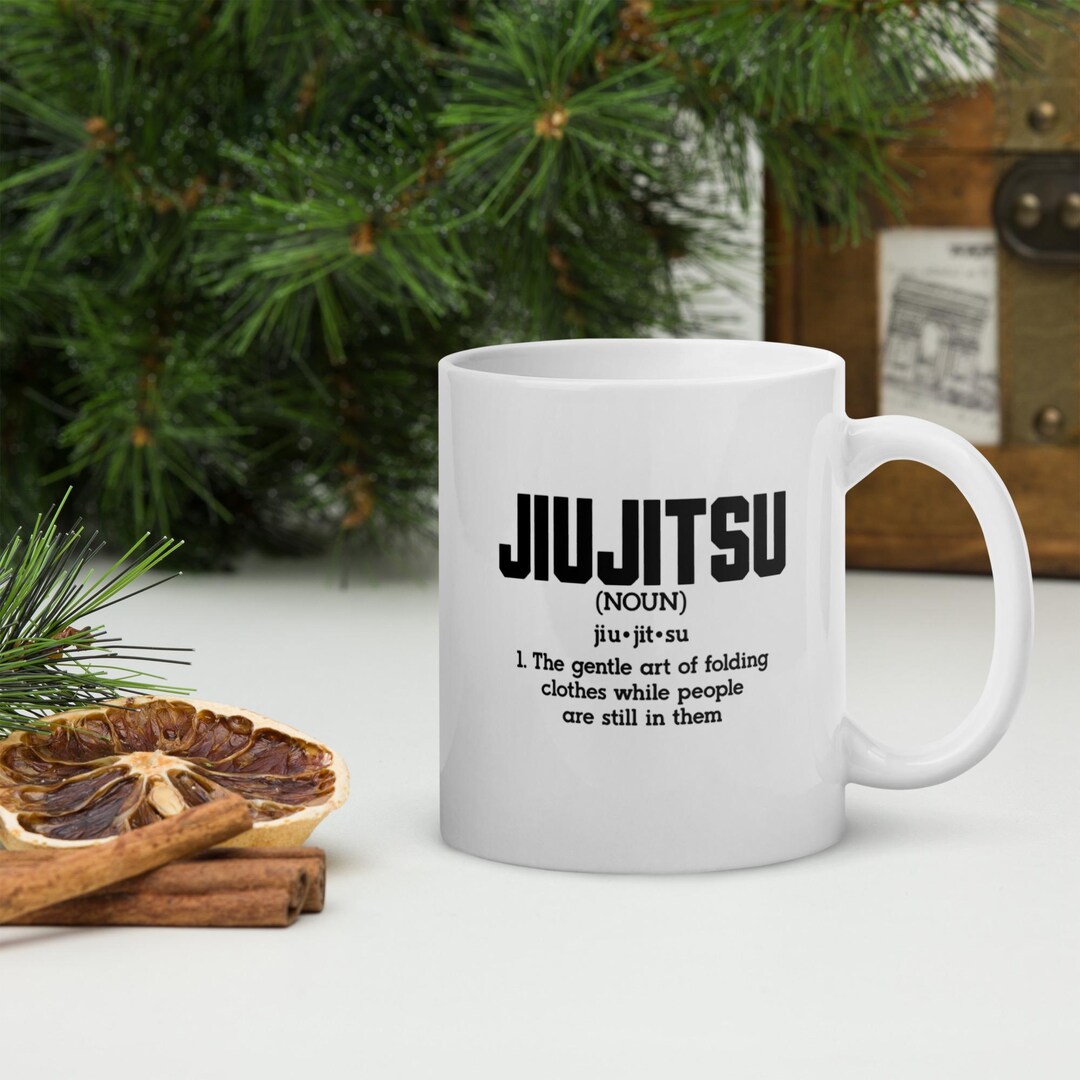 White Glossy Jiu Jitsu the Gentle Art of Folding Clothes While People ...