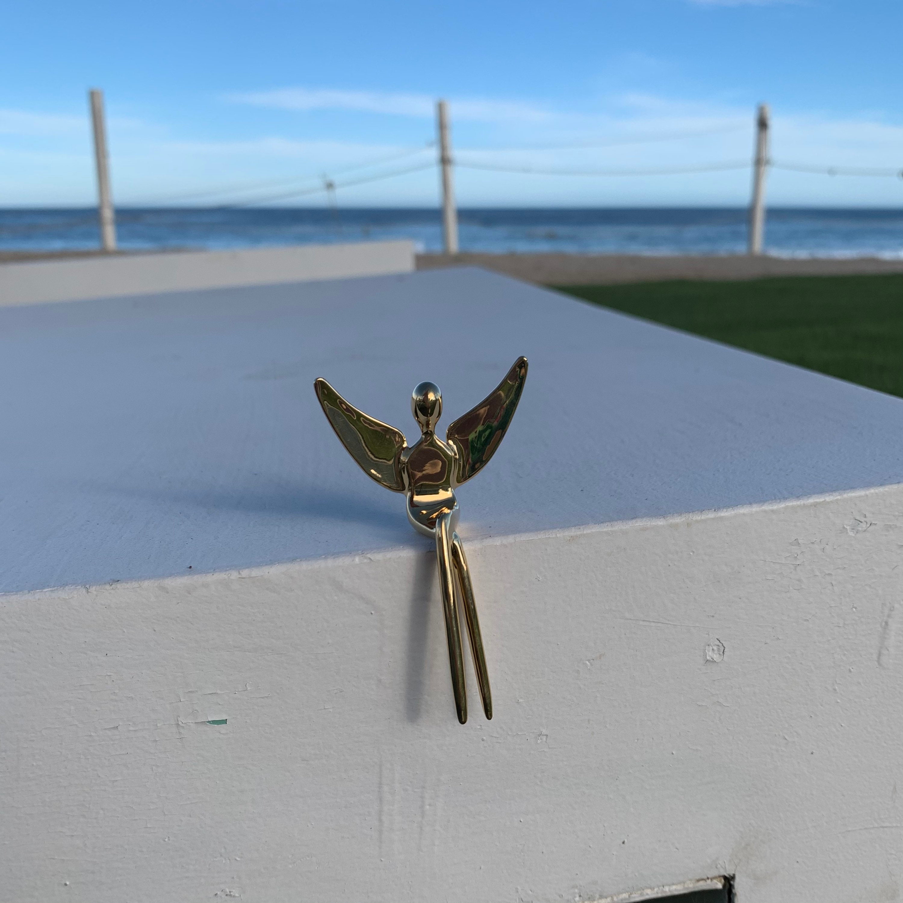 3 small gold angel sitting angel figurine perched on stone | Etsy