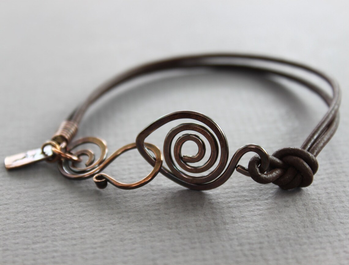 Brown leather copper bracelet with a swirl connector Rustic | Etsy