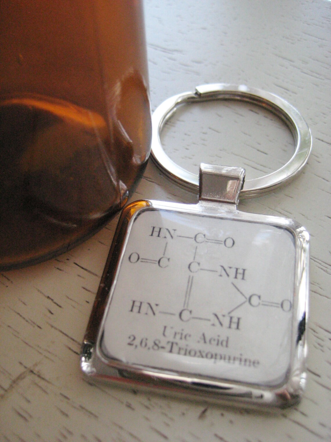 Organic Structure Stainless Steel Keychain of Uric Acid Sealed With ...