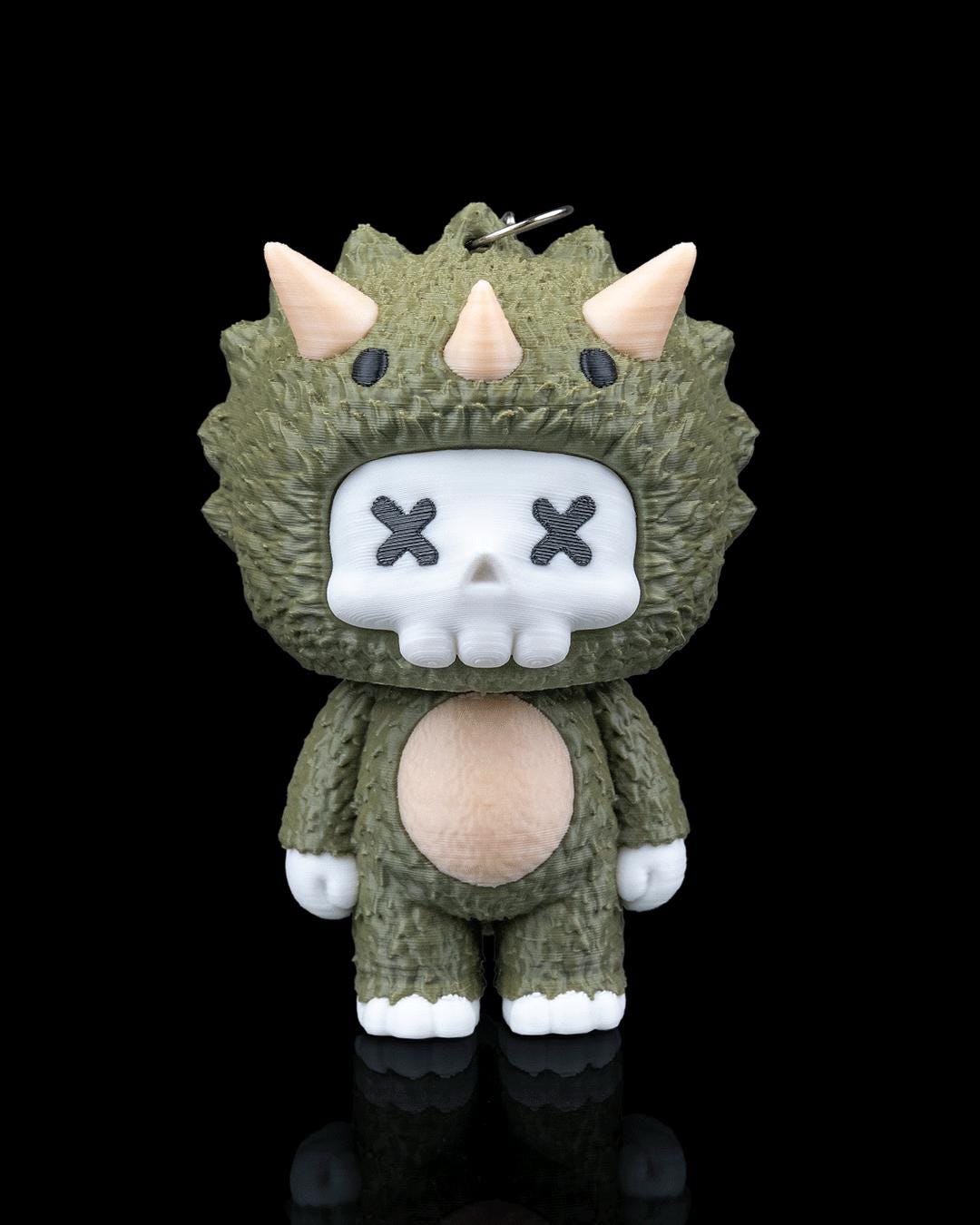 3D Printed Skubbie Dino Keychain: Trixi Skeleton in Triceratops Suit - Etsy