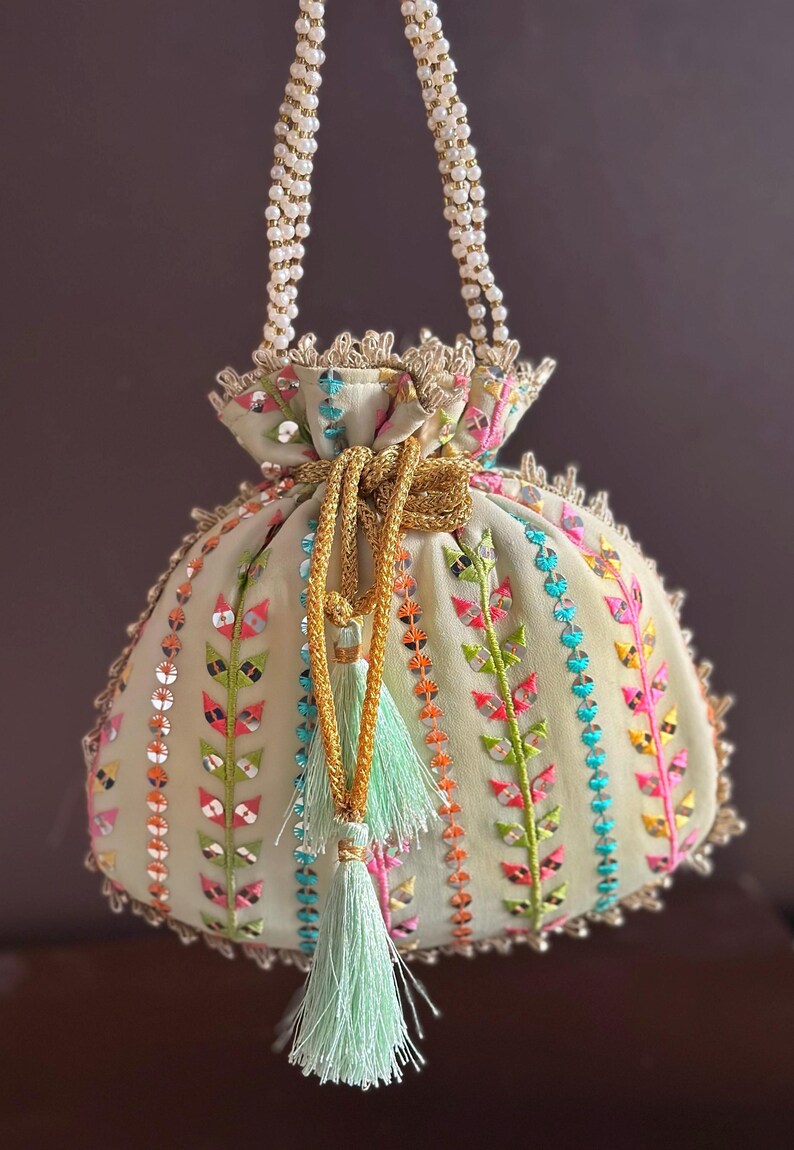 NAVELI Pista Green Multicolored Zardozi Embroidery Potli With ...