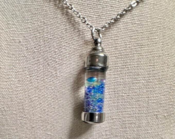 Liquid Sensory Vial Pendant Moving With Liquid Fluid Motion in ...