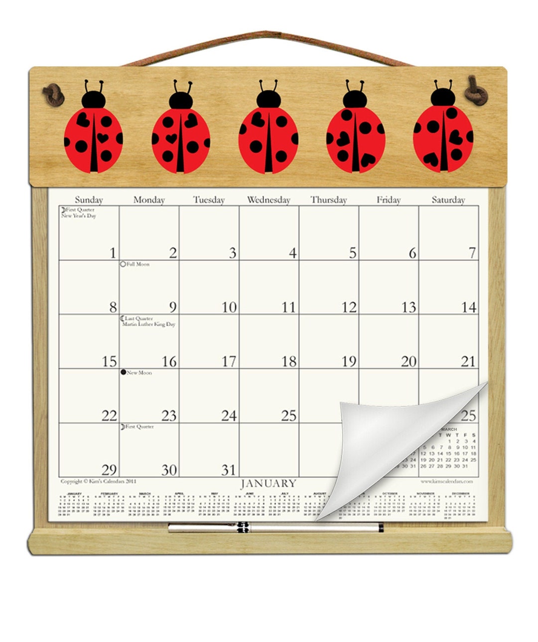 Wooden Calendar Holder filled with a 2026 calendar and includes an ...