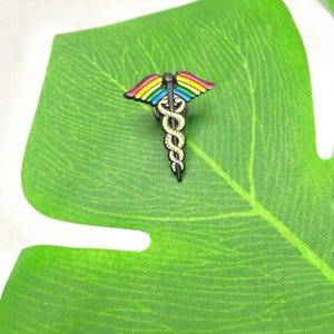 1 1/4” LGBTQIA+ Caduceus Enamel Pin - Symbol of Pride and Care - Etsy