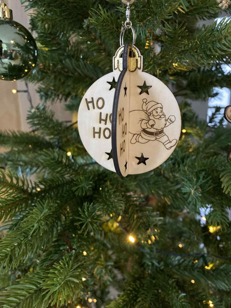 Rotating 22-karat Gold Wooden Christmas Bauble – Animated Santa Claus ...