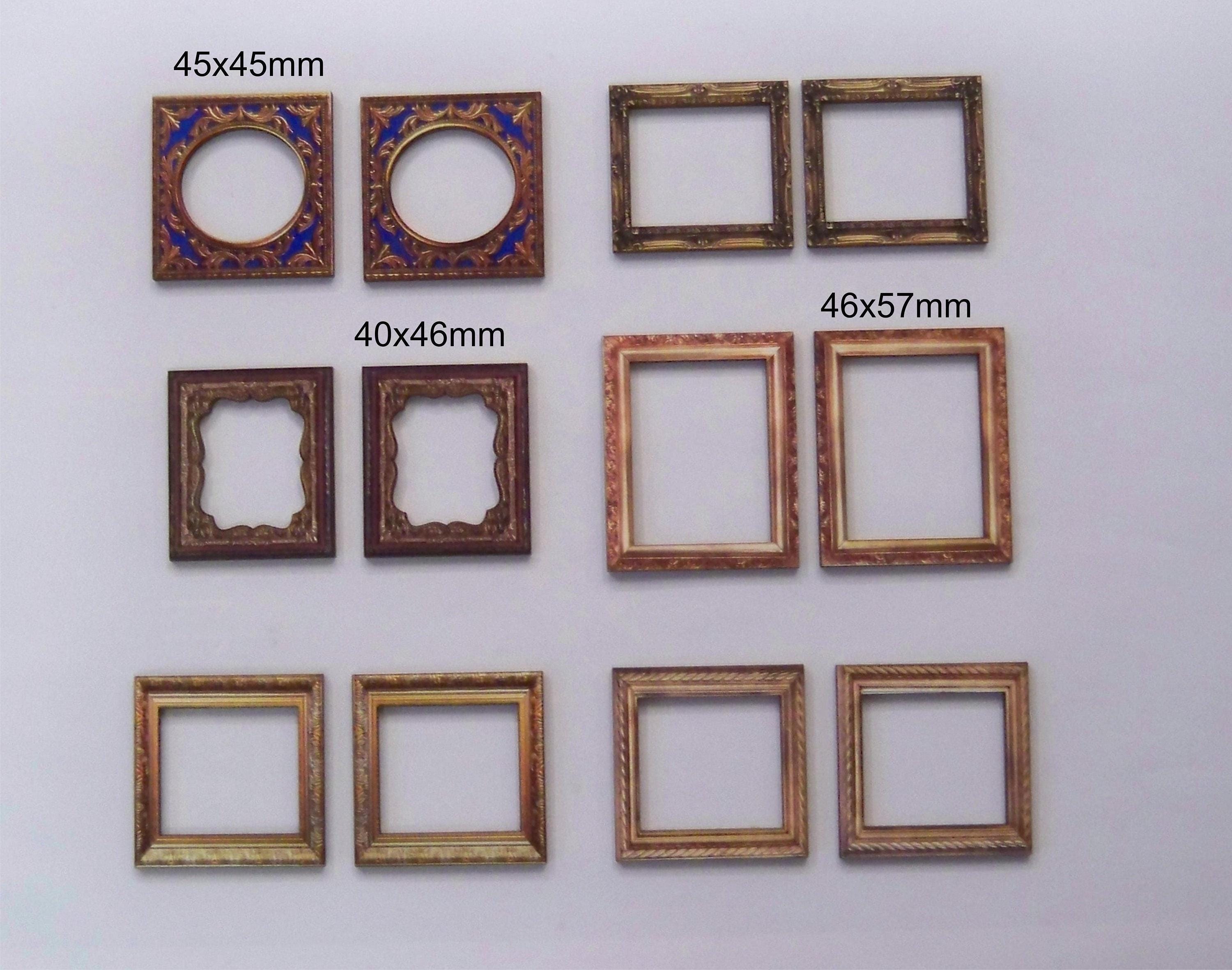 Picture Frames. Photo of Miniature Frames on Wood. (2D Design) Attach ...