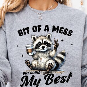 Bit of a Mess Raccoon PNG SVG, Funny Coffee Raccoon Clipart, Doing My ...