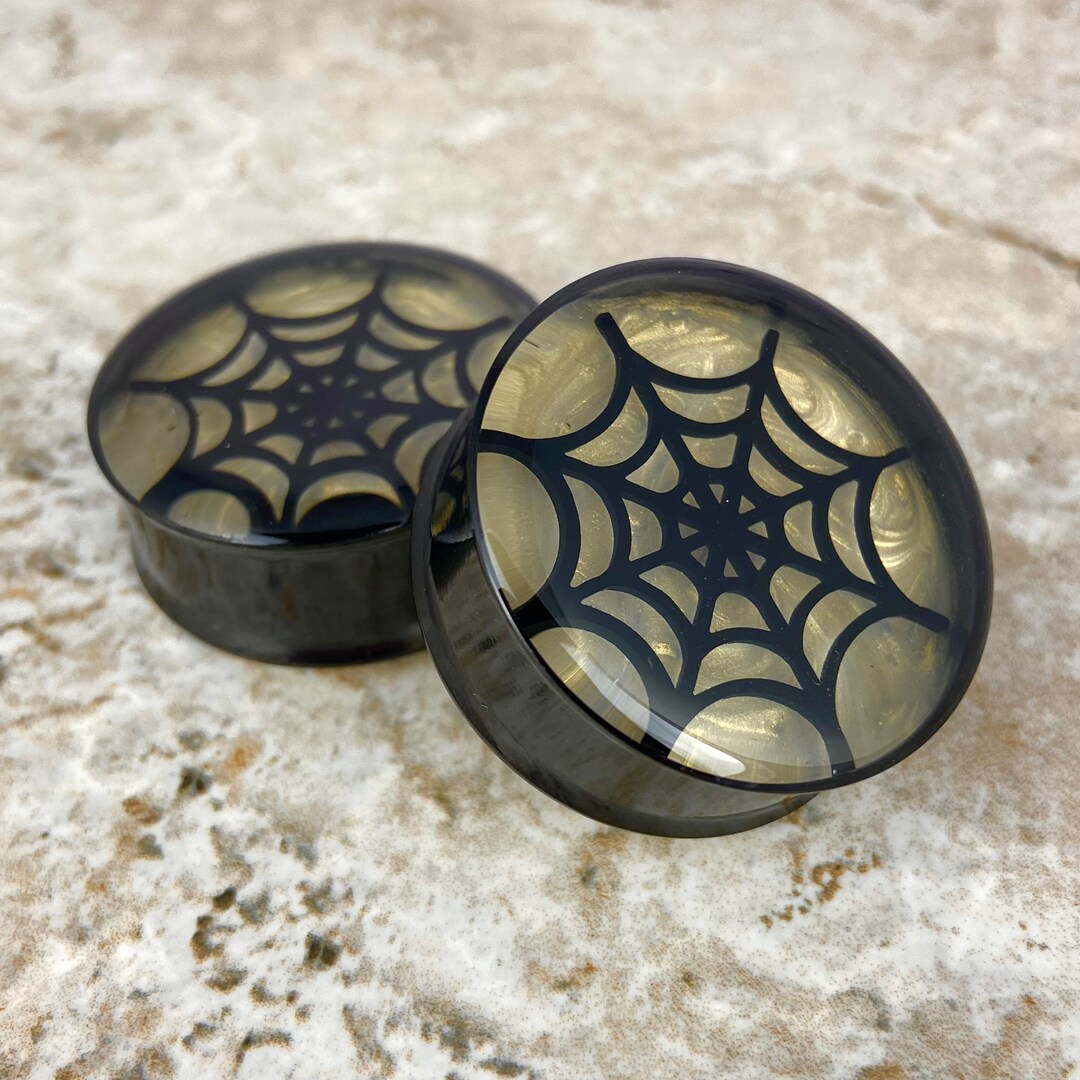Pair of Black Embedded Spider Web Over Golden Pearlescent Resin Plugs ...