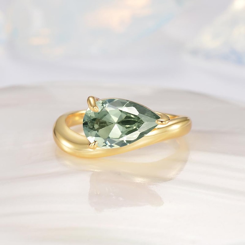 Floating East West Pear Ring - Etsy UK