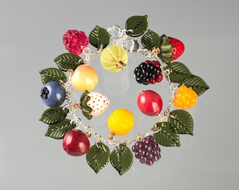 Hand blown glass fruit jewelry and sculptures by GlassBerries