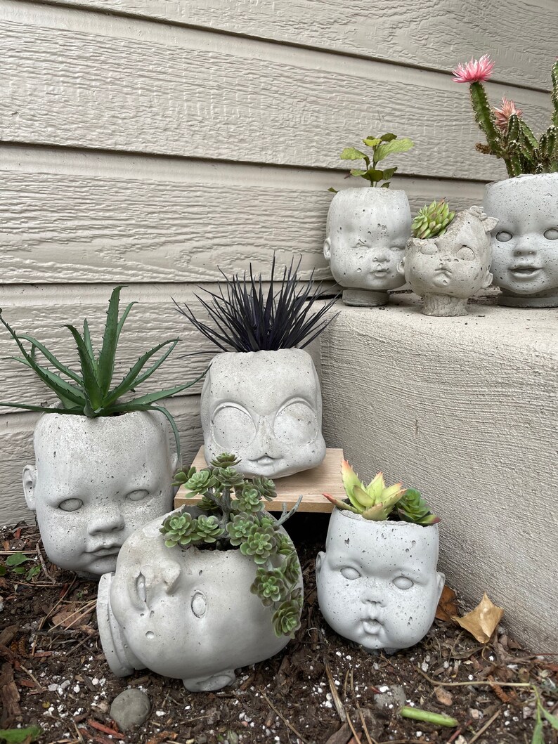 Large Sideways/Fallen Concrete Baby Doll Head Planter | Etsy