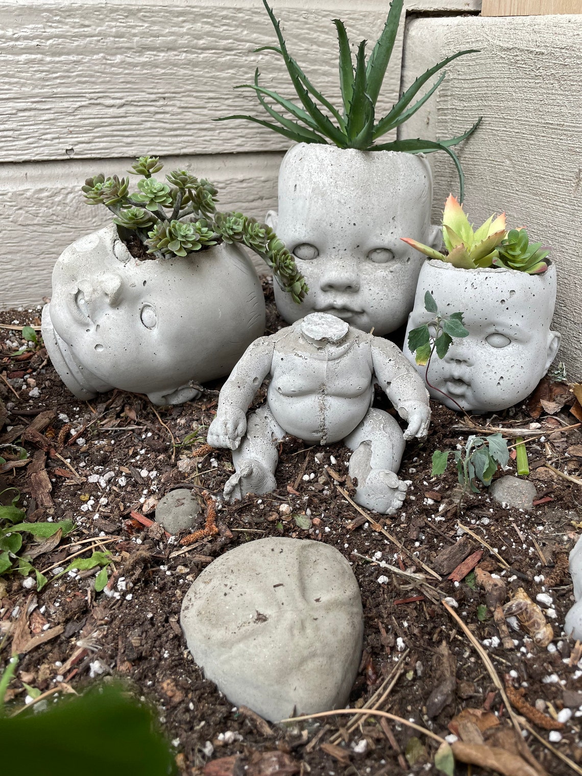 Large Sideways/Fallen Concrete Baby Doll Head Planter | Etsy