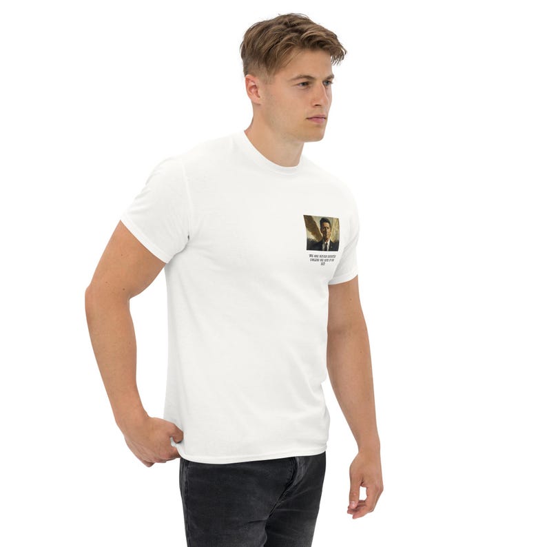 Ronald Reagan T-shirt With Angel Wings, We Are Never Defeated Quote ...