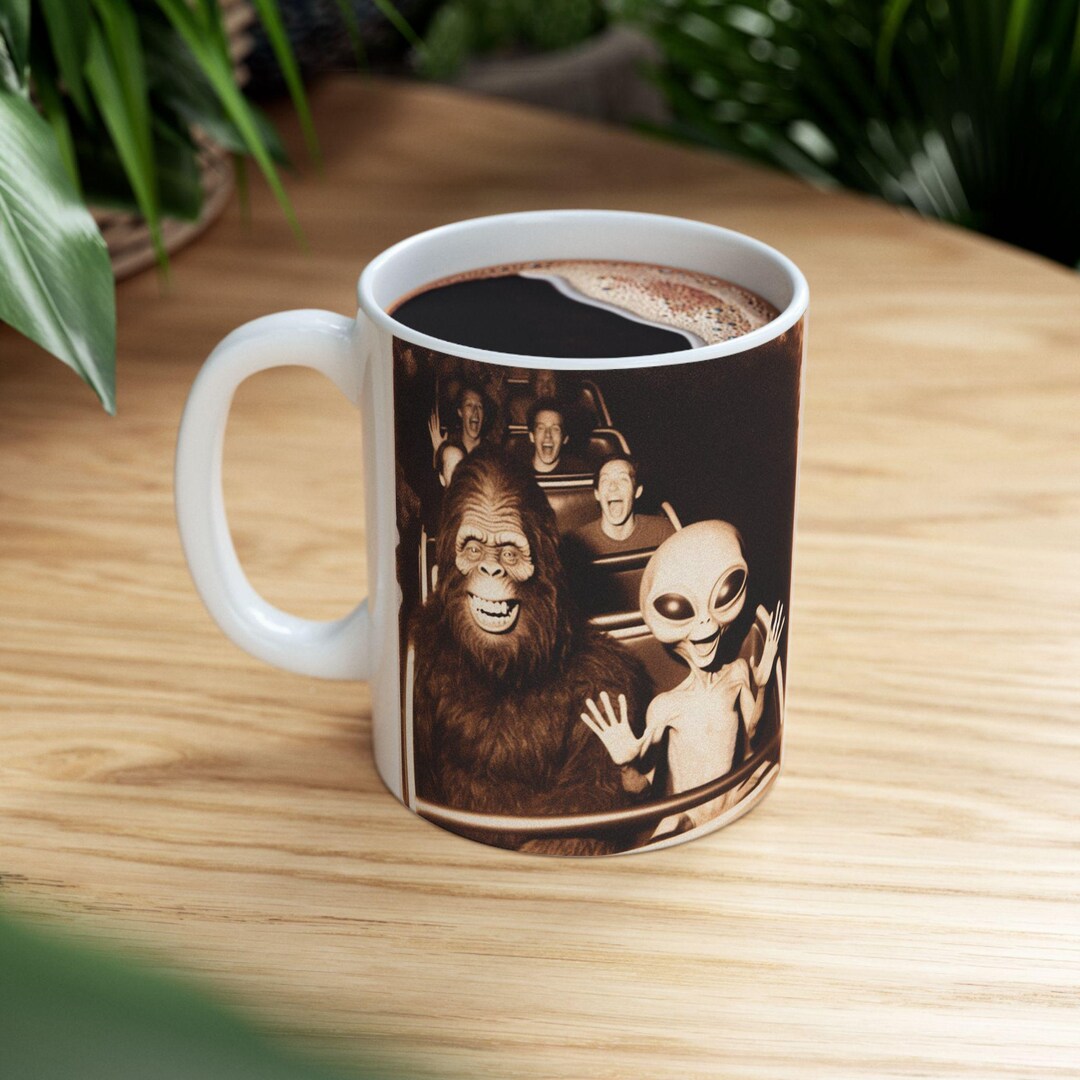 Bigfoot & Alien Roller Coaster Coffee Mug: Funny Cryptid Theme Park ...