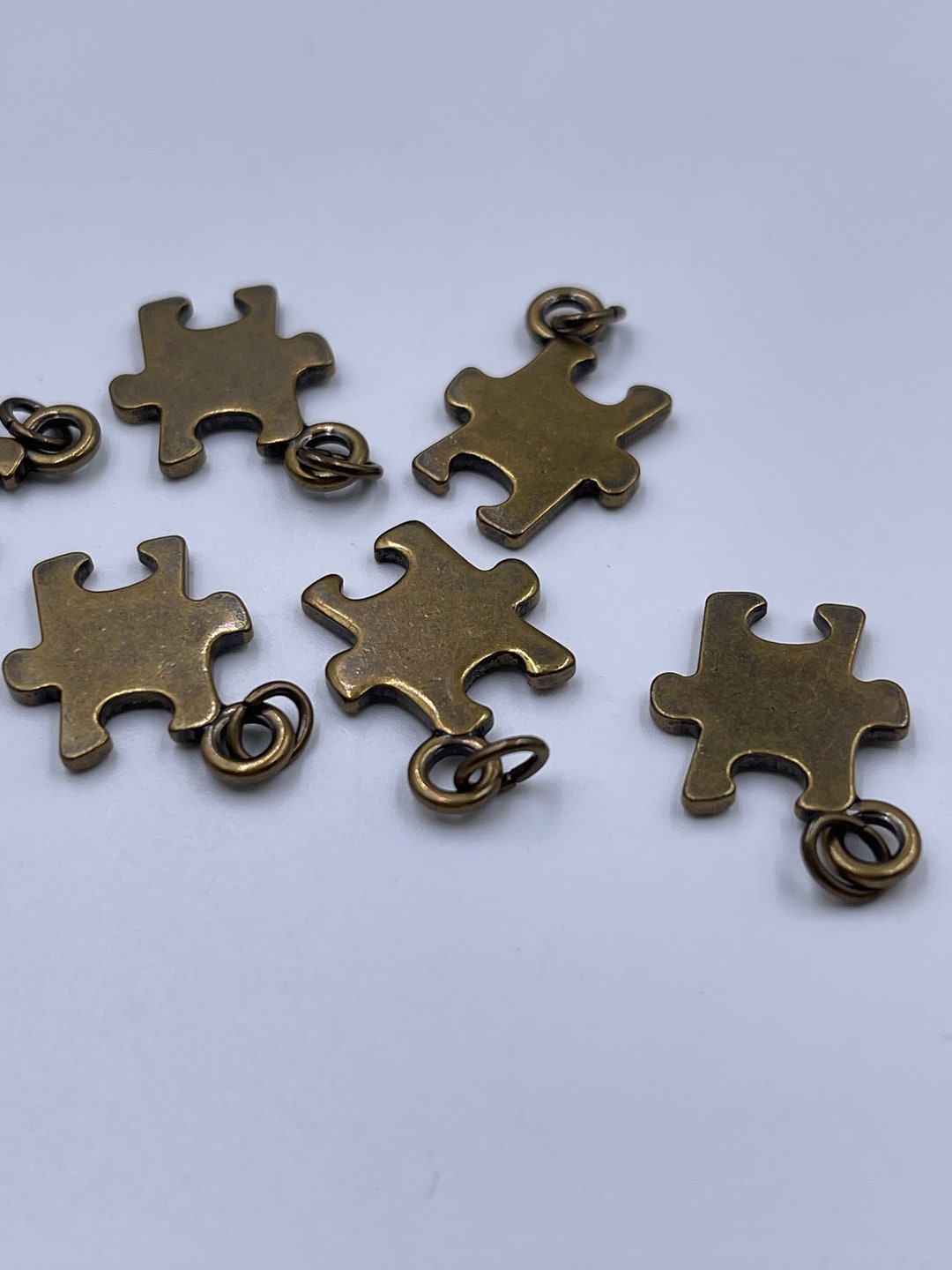 Antique Brass Plated Puzzle Piece Charm: 14mm Tall - Etsy