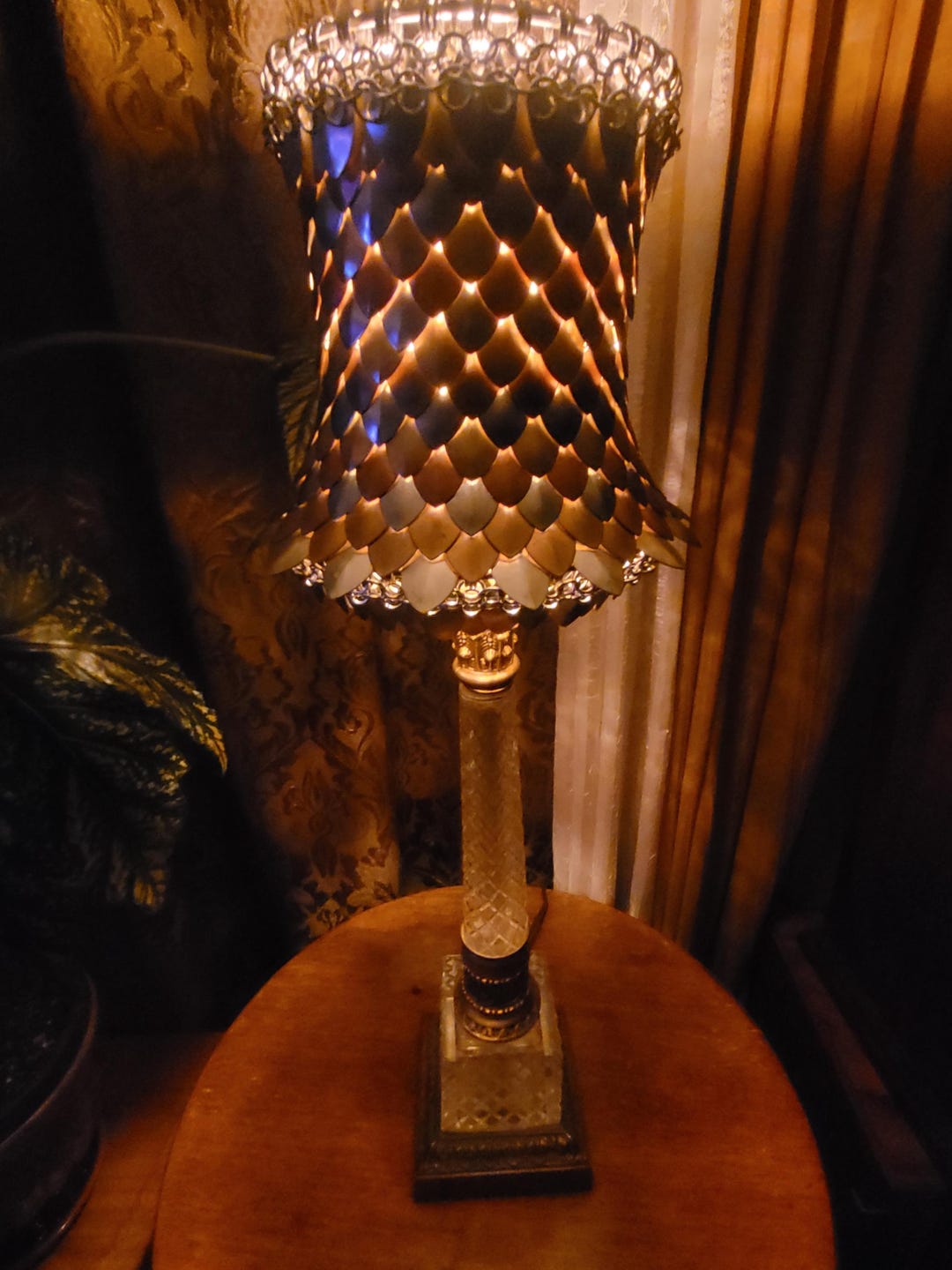 Medieval Multi Color Metal Dragon Scale Lampshade Atop an Antique ...