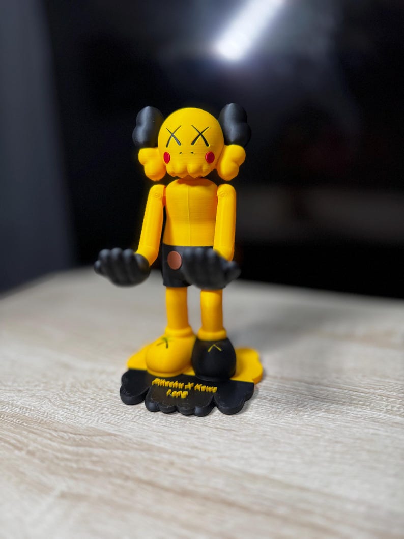 Pikachu X Kaws Crossover Controller or Phone Holder for Gaming Pokemon ...