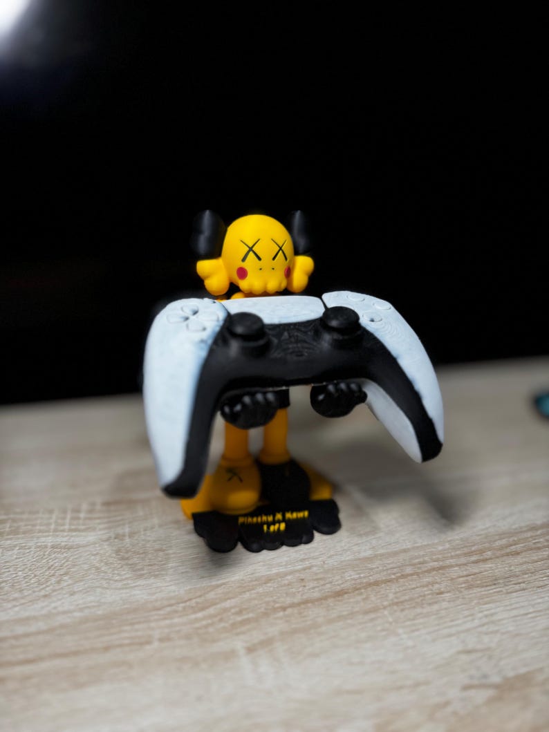 Pikachu X Kaws Crossover Controller or Phone Holder for Gaming Pokemon ...