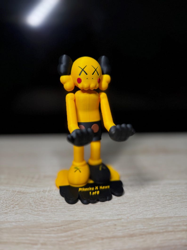Pikachu X Kaws Crossover Controller or Phone Holder for Gaming Pokemon ...