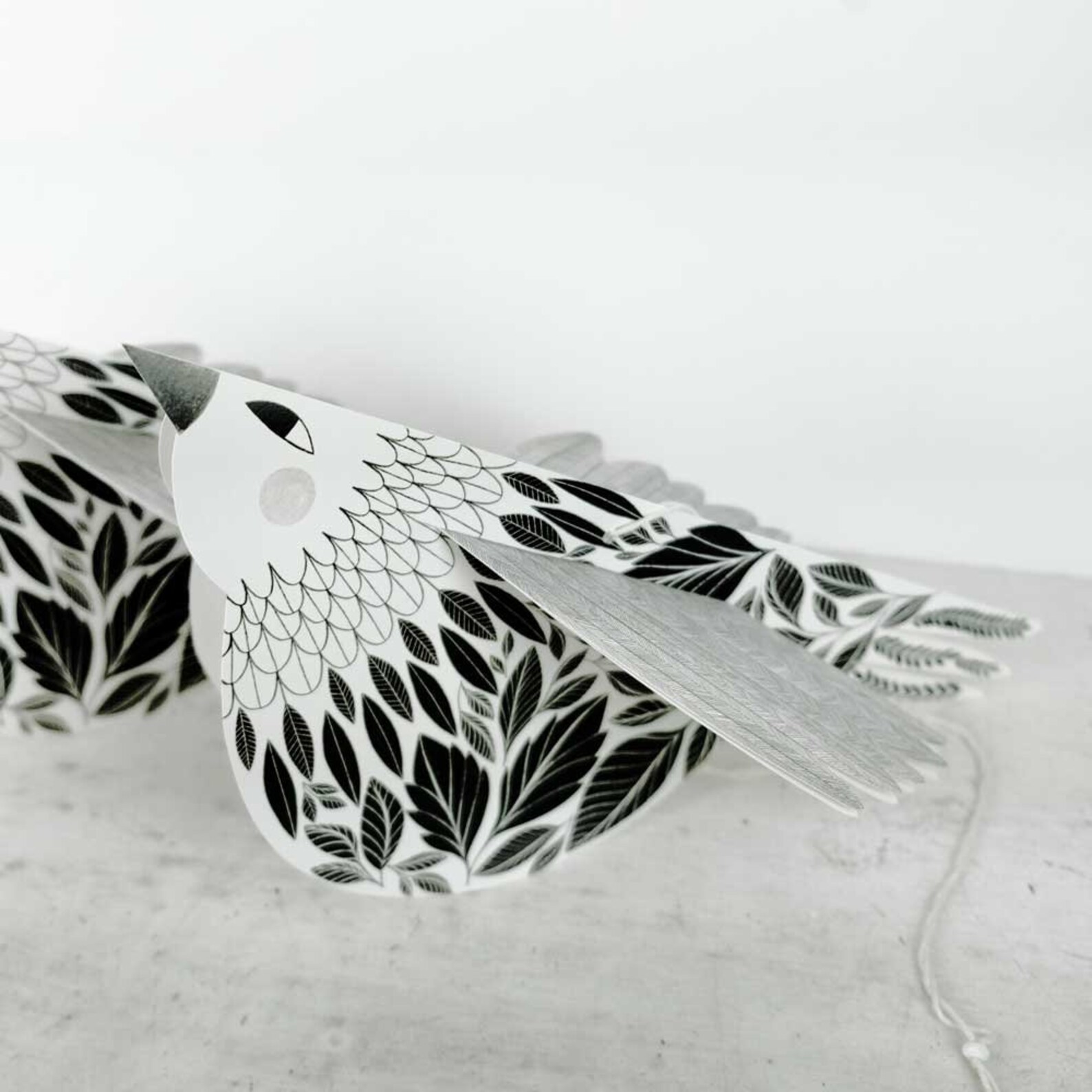Illustrated Hand Cut Paper Bird With Black and White Leaves, a ...