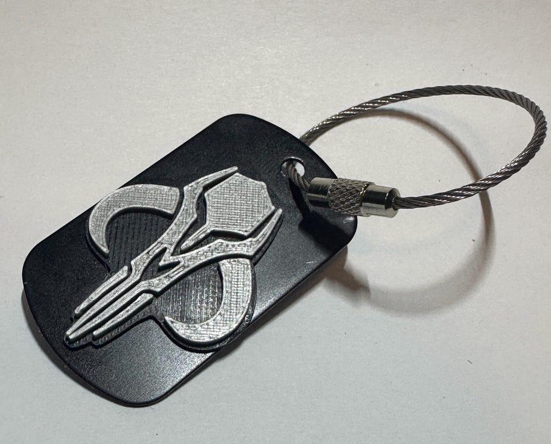 The Mandalorian Mythosaur Signet Keychain - Etsy