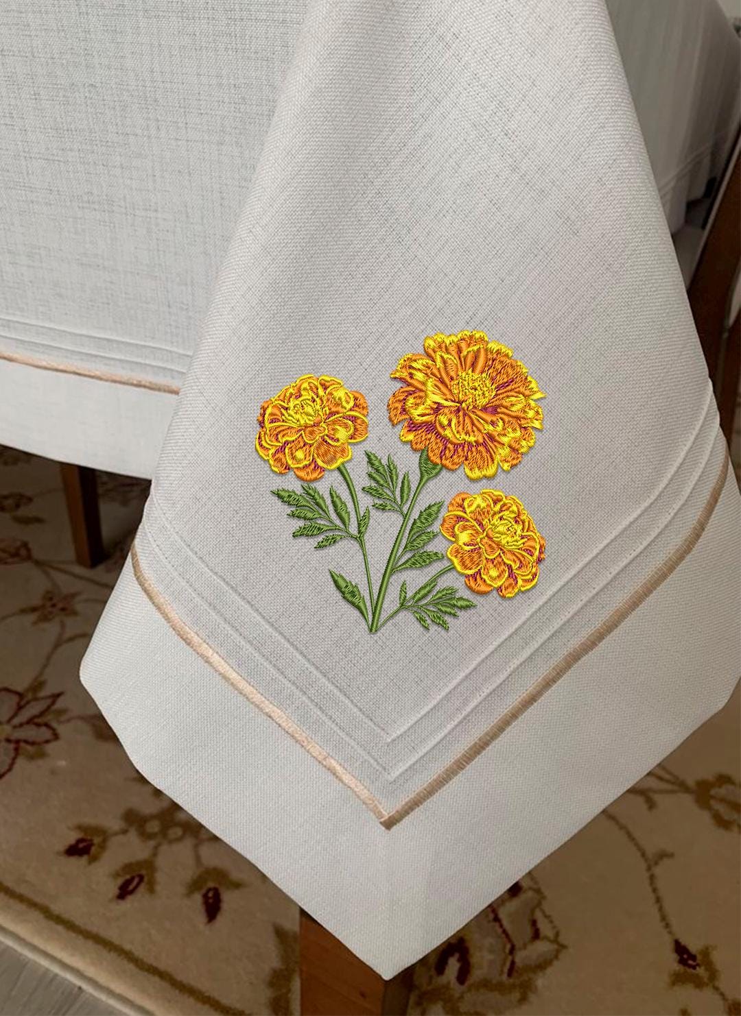 Machine Embroidery Design of a Floral Pattern With Three Orange ...