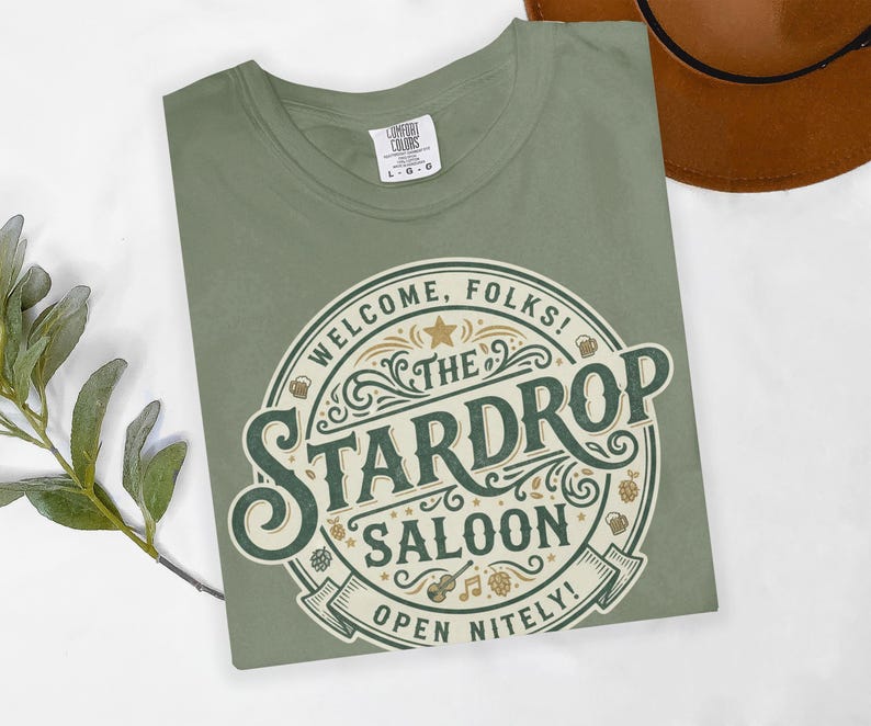 Stardrop Saloon Shirt, Stardew Valley T-shirts + Sweatshirts, Pelican ...