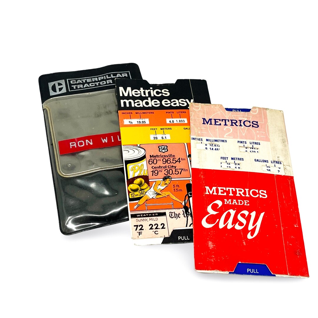 VINTAGE 70s Caterpillar Pocket Protector + 2 Metric Pocket Slide Rule ...