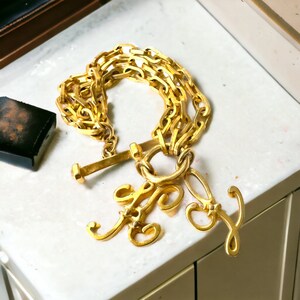 Vintage ICONIC Karl Lagerfeld Gold Plated Chain LOGO Charm KL Bracelet ...