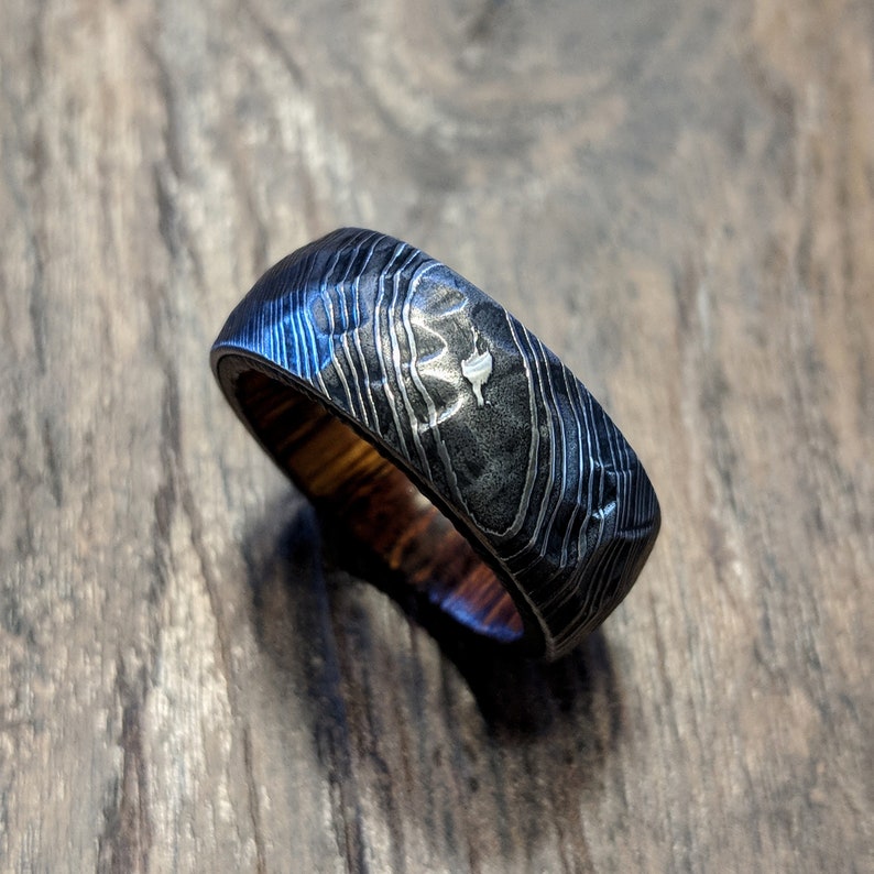 Damascus Steel Wedding Band With Ironwood Sleeve and Hammered | Etsy