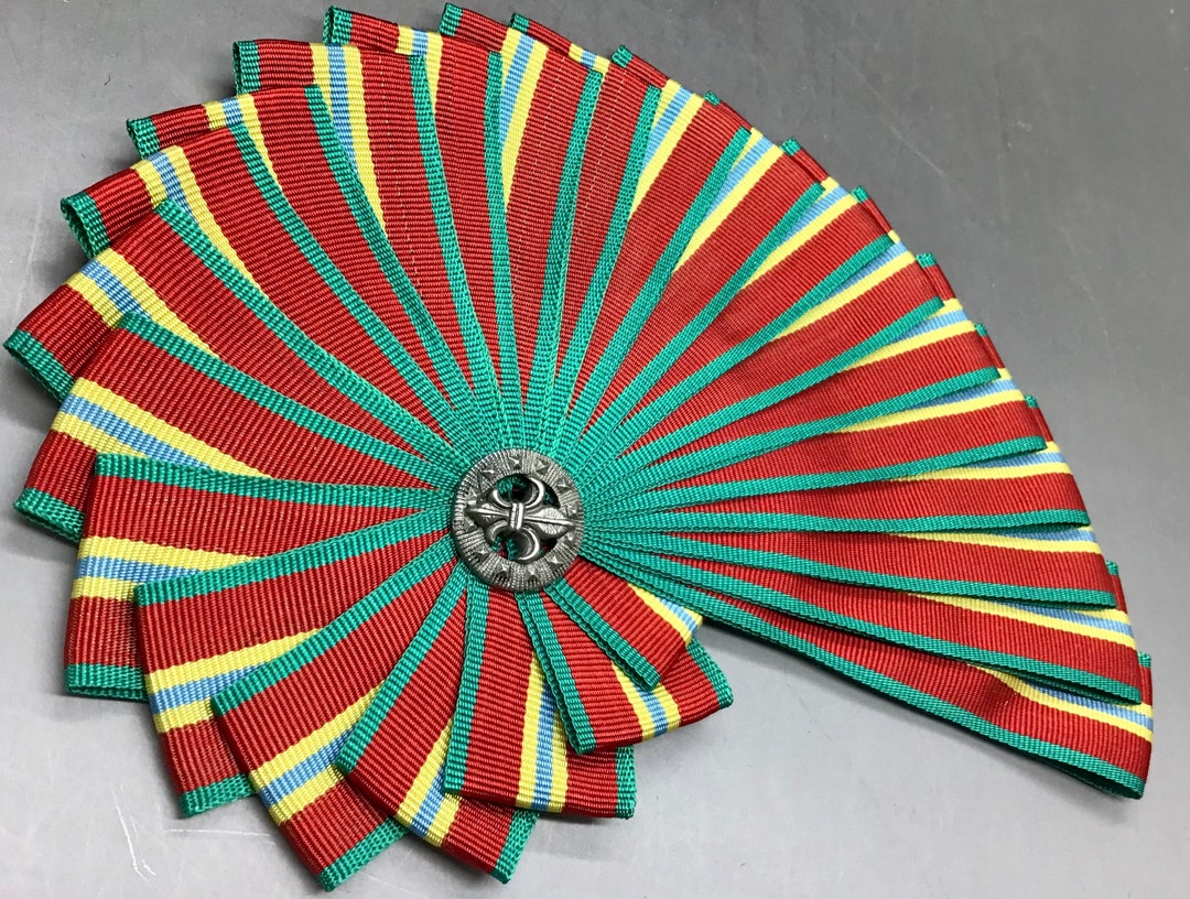 Red, Yellow, Blue and Green Chambered Nautilus Cocarde Cockade ...