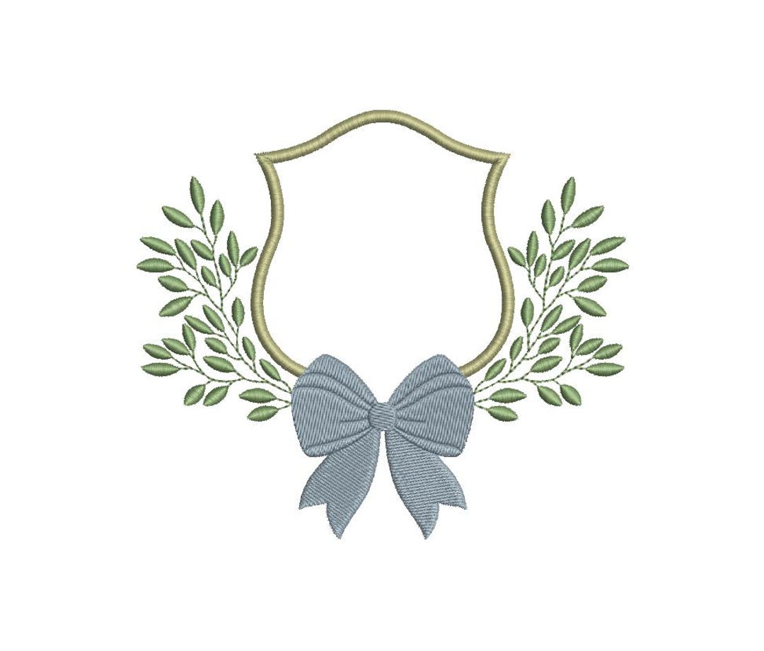 Diseño de bordado de marco de escudo con hojas y lazo, marco de ...