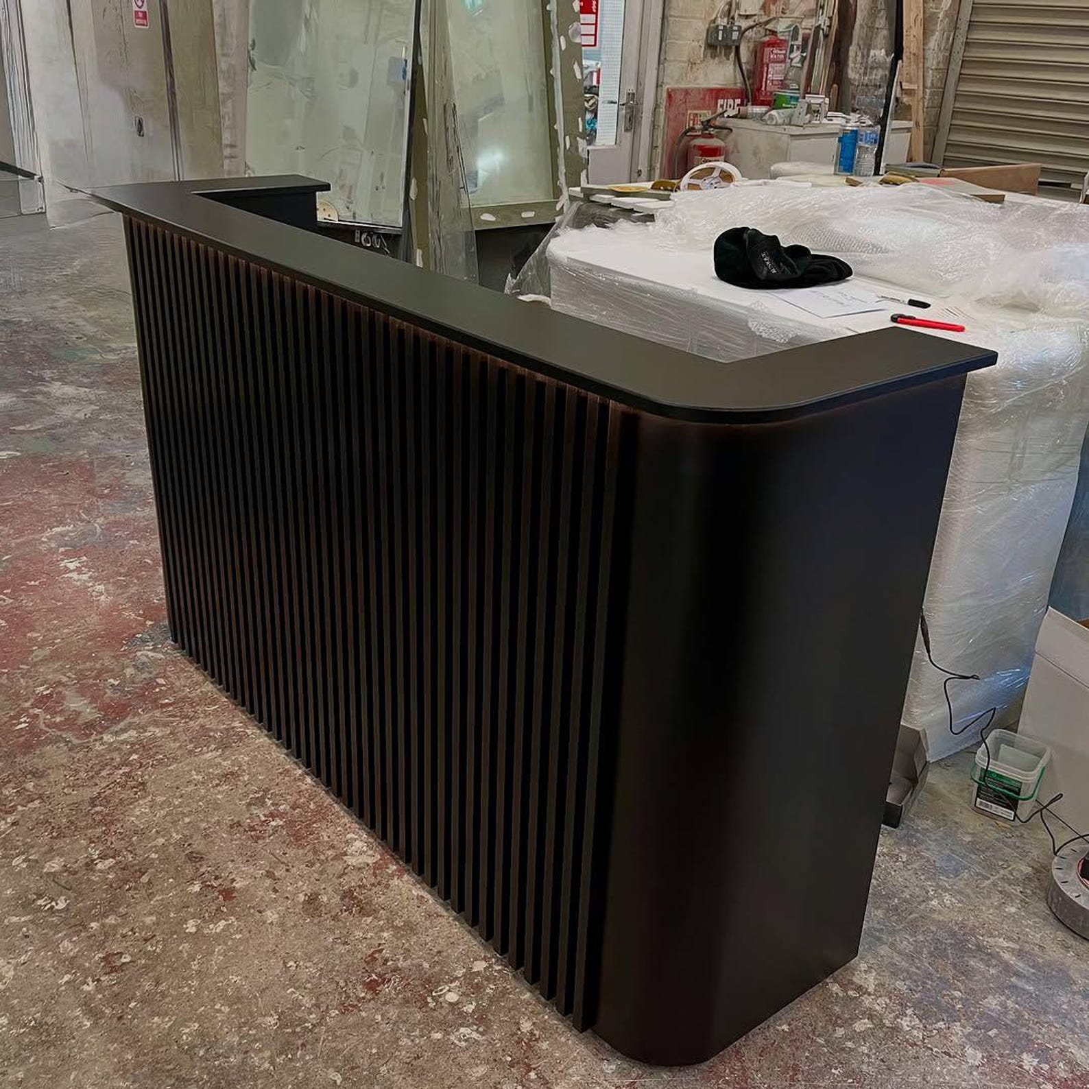 Sleek Black Reception Desk With Ribbed Panel Design - Etsy