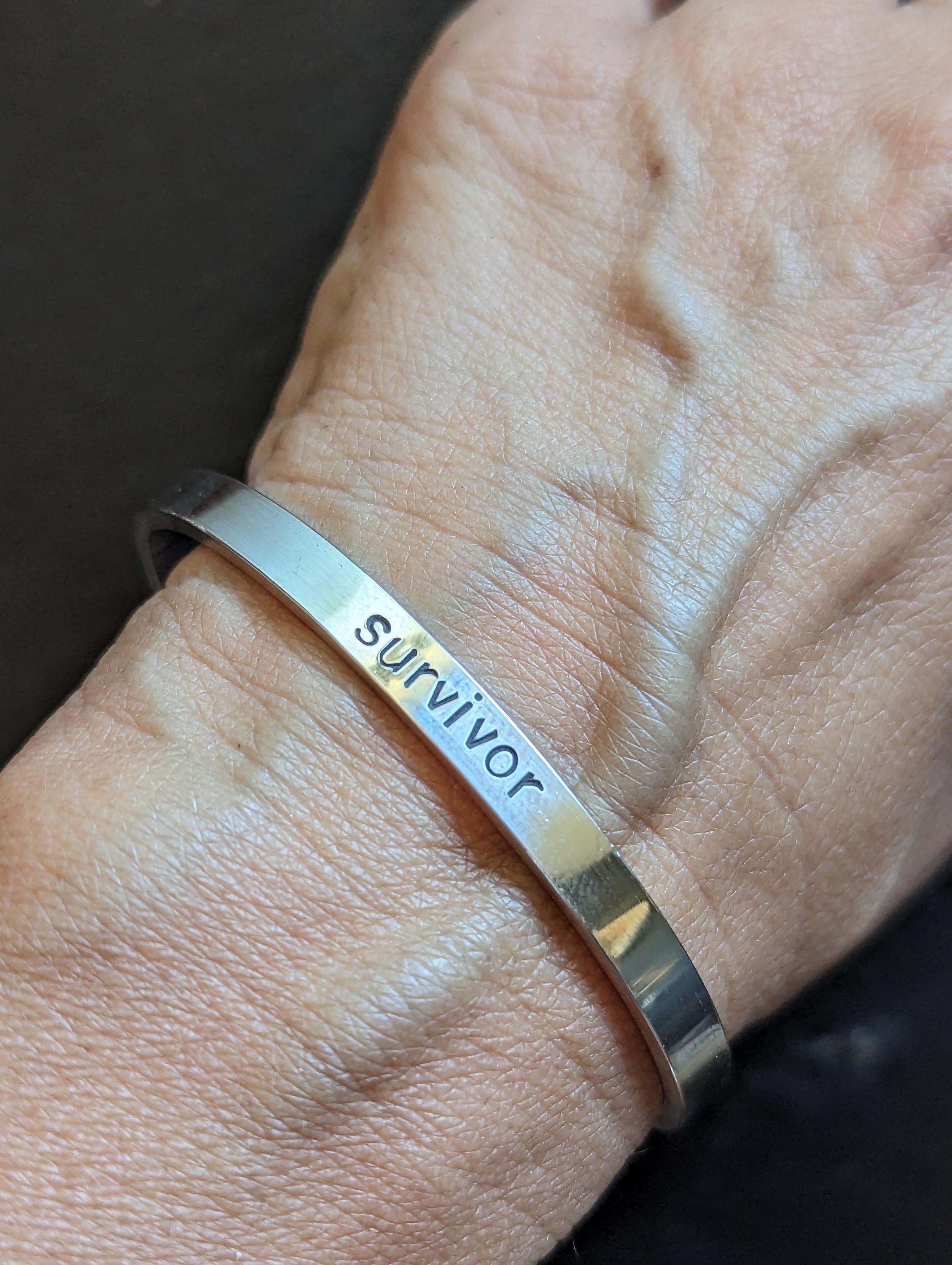 Survivor wristband store